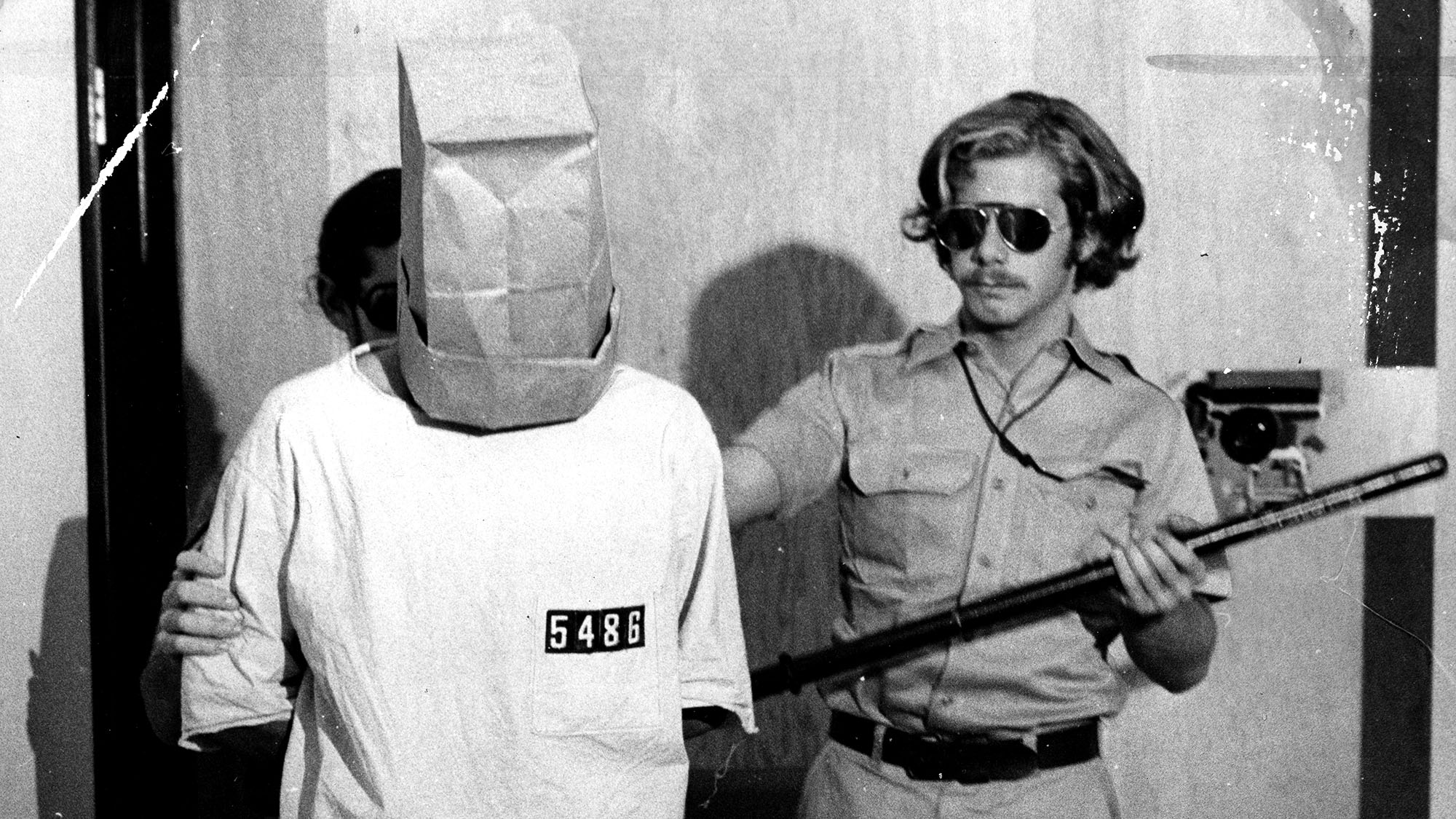 Prisoner with guard John Loftus, involved in the Stanford Prison ...